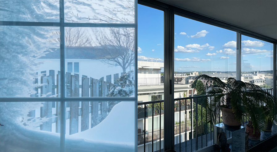 Pose de film anti froid sur fenêtre thermique